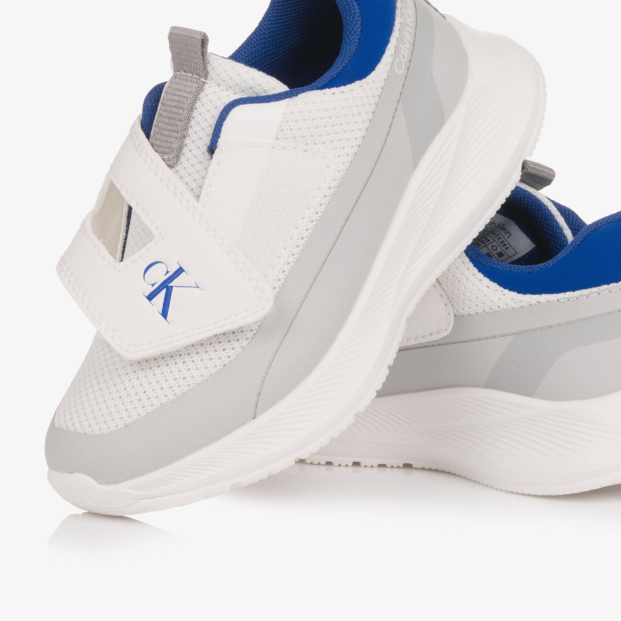 Calvin Klein - White Mesh Trainers with Velcro Fastening | Childrensalon