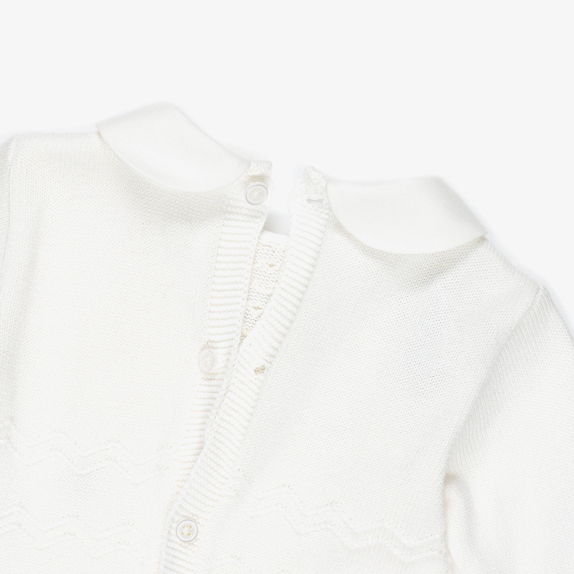 PAZ Rodríguez - Ivory Cotton Knit Babygrow with Knot Stitch Detail ...